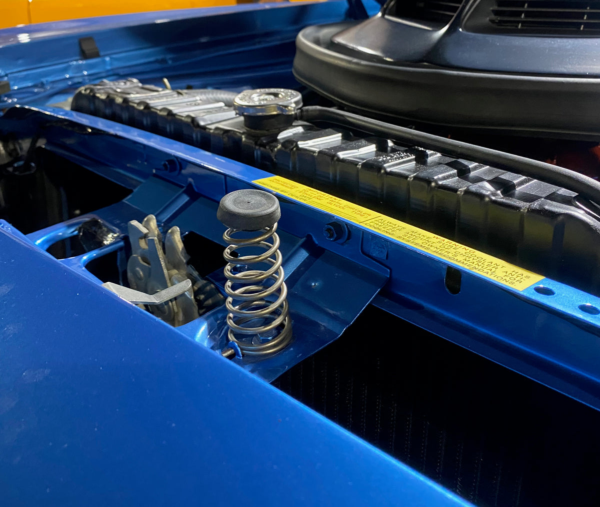 Hood Spring Protector – Schumacher Creative Services Inc. - Engine Swaps